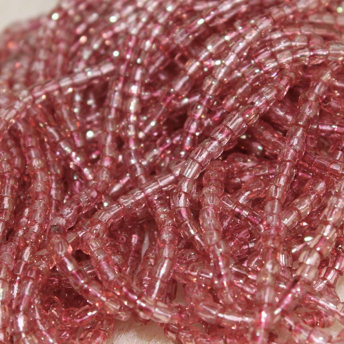 Rose Glow Transparent Tri-Cut Seed Beads - 9/0 – Out West Beads